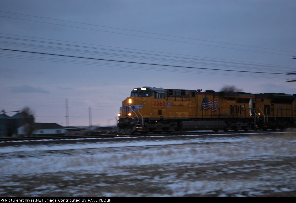 UP 7362 rolls east towards UP North Platte, Ne yd on this winters evening.